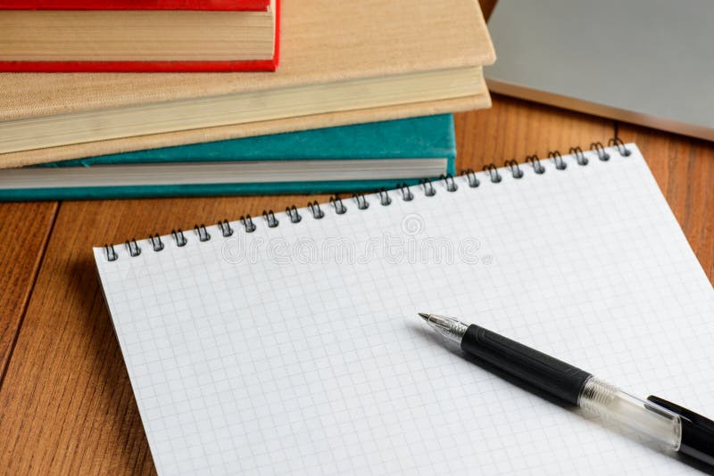 Ballpoint Pen and Notepad on a Wooden Table Stock Photo - Image of ...