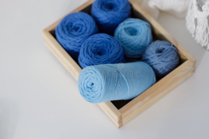 Balls of Blue and Light Blue Cotton Macrame Ropes in a Wooden Box on a ...