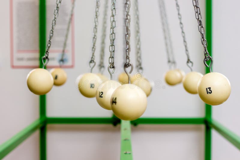 Balls Hanging on Chains Swing_ Stock Image - Image of closeup, swinging ...