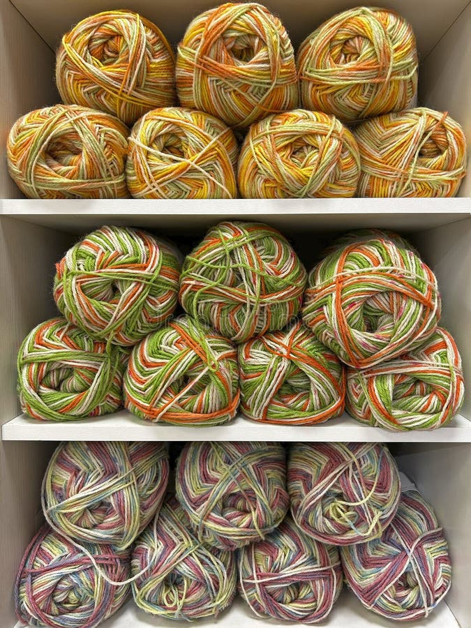 Balls of Multi-colored Wool for Knitting on the Shelf of a Needlework ...