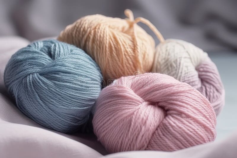 Balls, Skeins of Pastel-colored Yarn for Needlework on a Light Surface ...