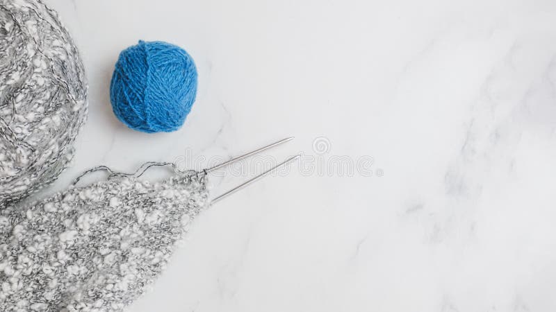 Balls of Woolen Thread and Long Metal Needles on on Light Background ...