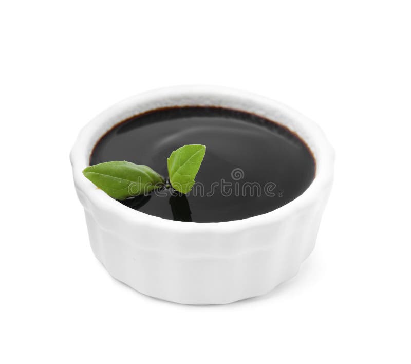 Balsamic Glaze with Basil Leaves in Bowl Isolated on White Stock Image ...