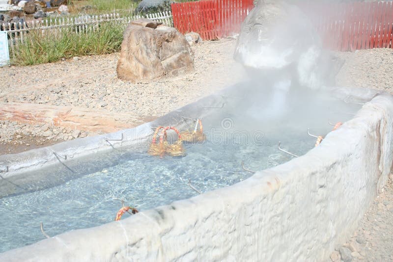 Bamboo Basket with Eggs Hanging in Hot Spring Pond Stock Photo - Image ...
