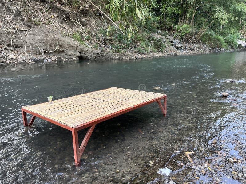 Bamboo Bed on the River with Clear Water. Stock Photo - Image of grass ...