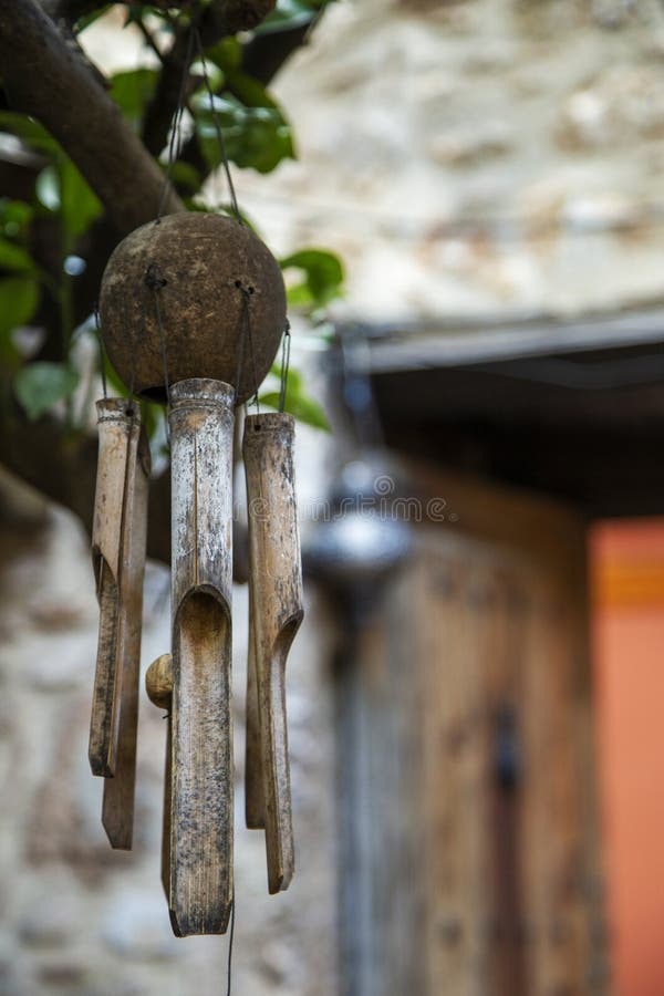 Bamboo Bell on a Tree Branch in the Street Stock Image - Image of water ...