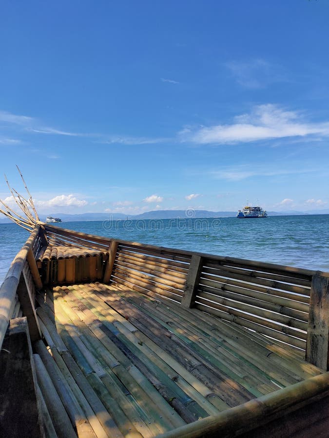 Bamboo boat at the sea stock image. Image of water, horizon - 202763119