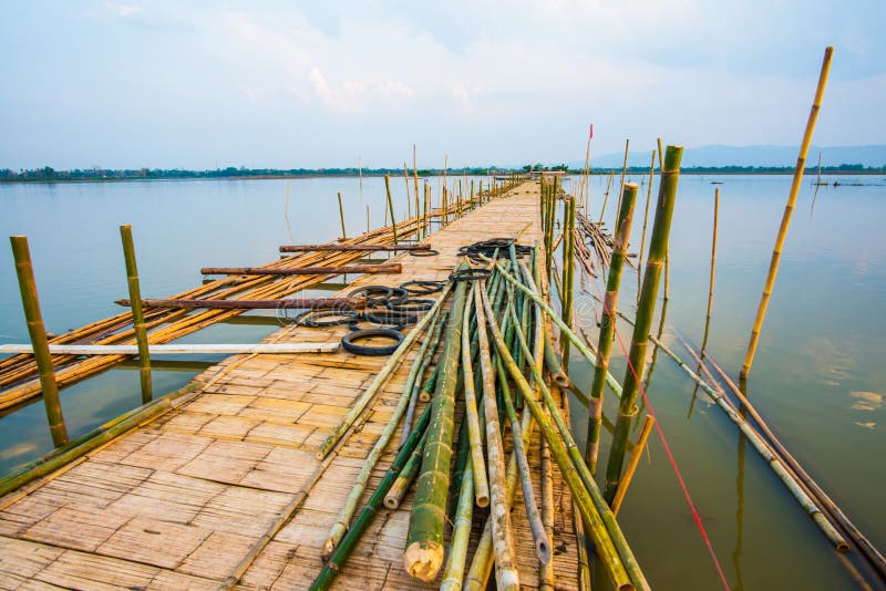 Bamboo bridge on the lake stock photo. Image of asia - 187852004