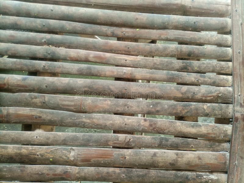 Bamboo chair stock image. Image of rest, stonewall, fence - 255697809