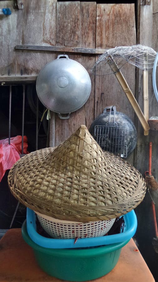 Bamboo Leaves Hat on Top of Vegetable Basket in Old Kitchen Stock Image ...