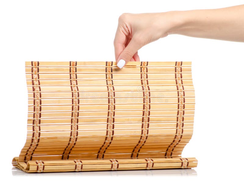 Bamboo mat natural in hand stock photo. Image of organic - 127323560