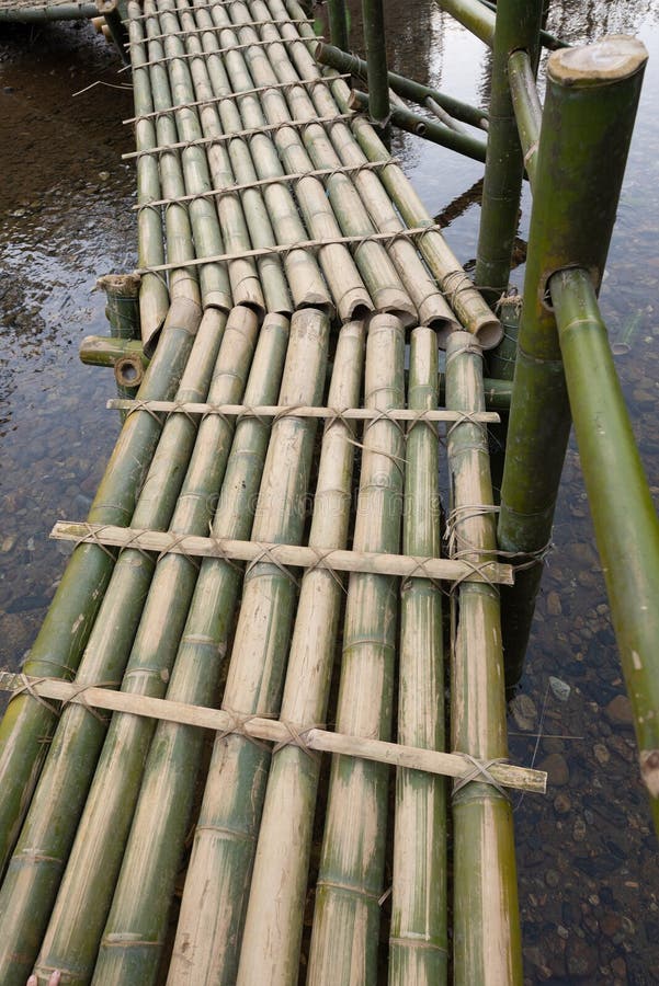Bamboo pedestrian bridge stock photo. Image of cambodia - 371565356