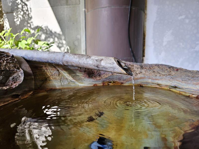 Bamboo Pipe with Washbasin in Japanese Garden. Stock Image - Image of ...
