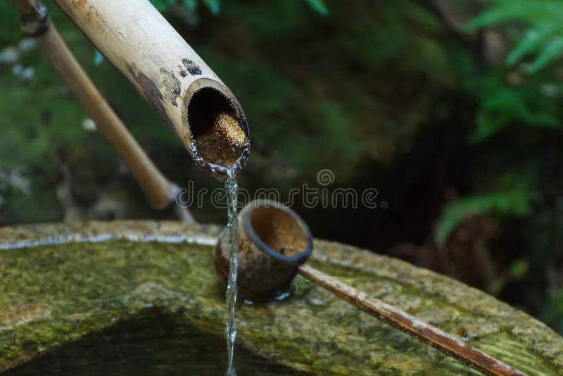 Bamboo Pipe with Water Dipper Stock Image - Image of like, traditional ...