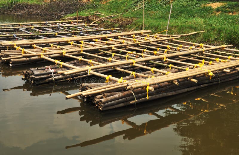Wooden raft in the water stock photo. Image of green - 43840634