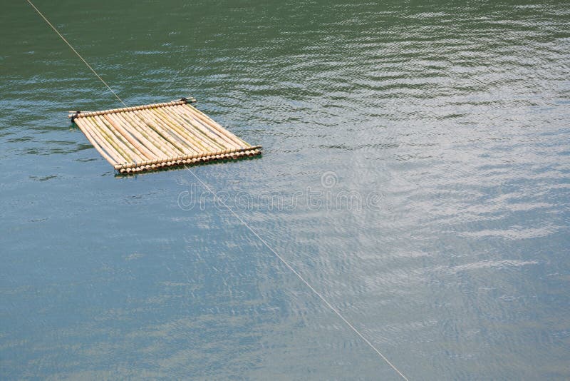 Bamboo Raft Floating on Water Stock Photo - Image of raft, cliff: 79564364