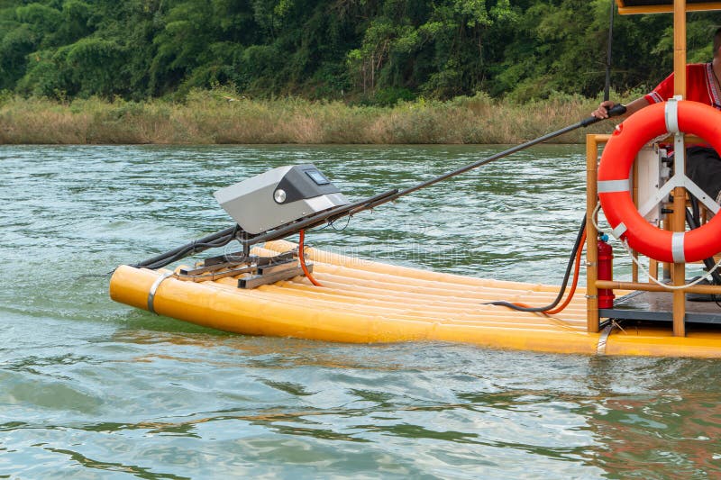 A Bamboo Raft Paddling on the River Stock Photo - Image of extreme ...