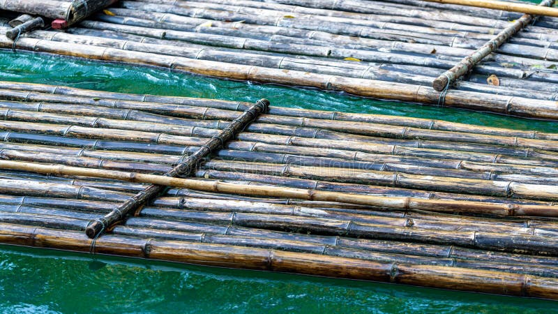 Bamboo rafts on a river stock photo. Image of kayak - 265098242