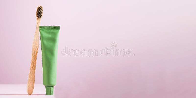 Bamboo Toothbrush and Toothpaste Mockup on Light Pink Background. Copy ...