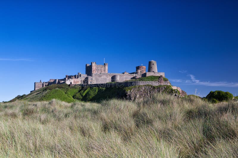 Bamburgh Castle on Top of the Rock Stock Image - Image of beach, ocean ...