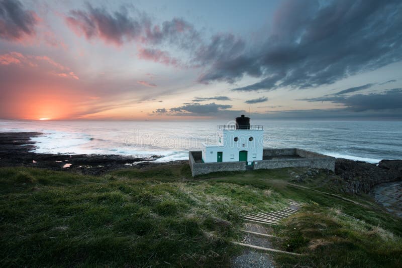 Bamburgh Lighthouse on the Northumberland Coast, England Stock Image ...