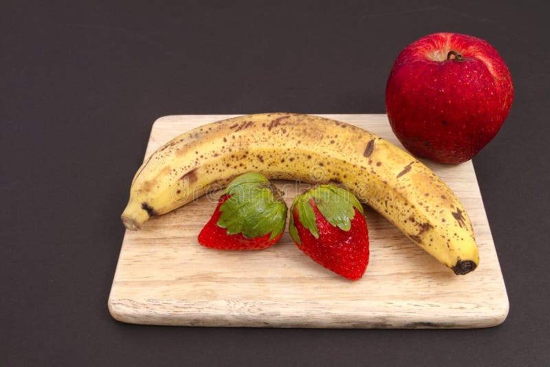 Banana Apple and Strawberries Stock Image - Image of sweets, ground ...