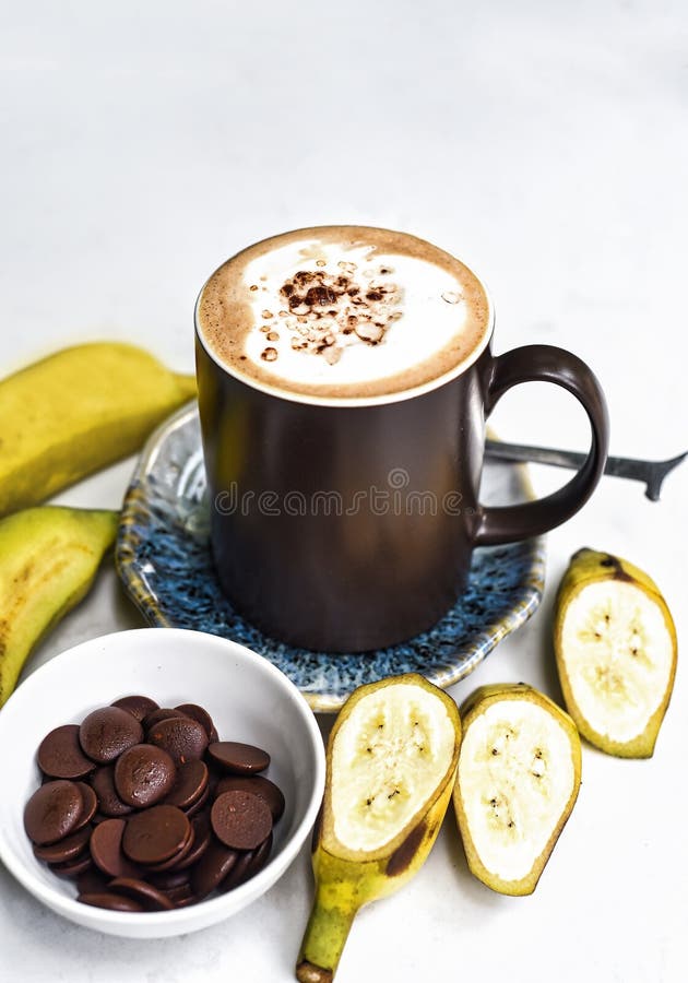 Banana Chocoalte Latte with Fresh Banana and Chocolate Drops on White ...