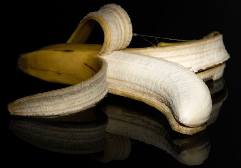 Banana on the mirror stock photo. Image of banana, mirror - 207841014