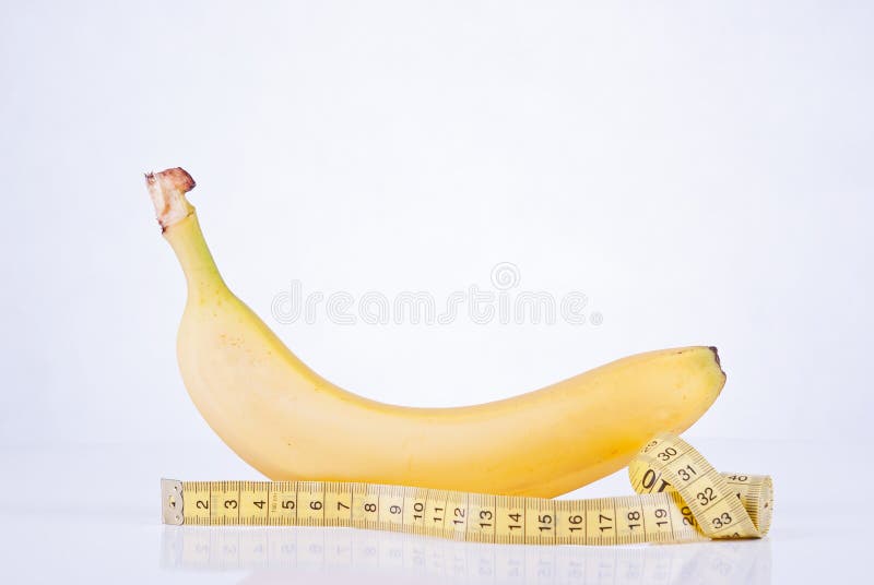 Banana and measuring tape stock photo. Image of centimeter - 40056786