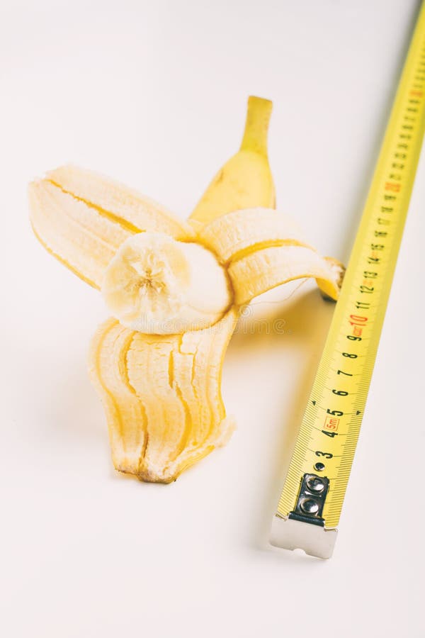 Banana and measuring tape stock image. Image of dimension - 94936839