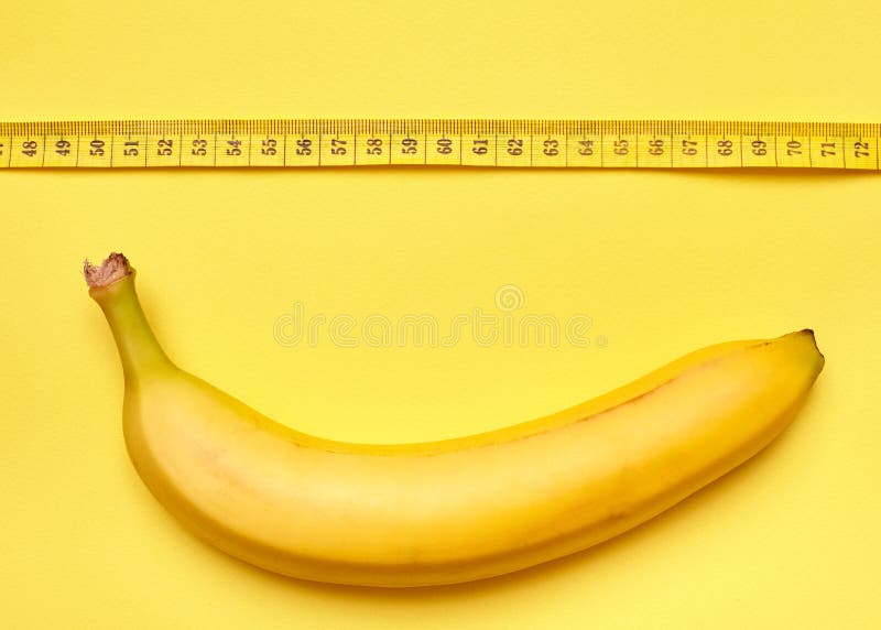 Banana with Measuring Tape on a Yellow Background Stock Photo - Image ...
