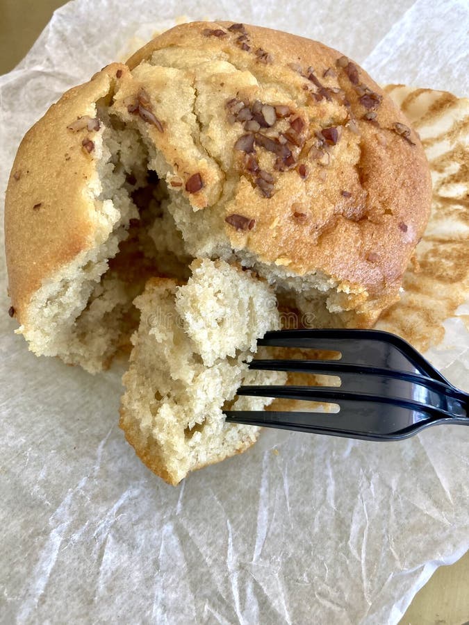 Banana Nut Muffin on Paper stock photo. Image of treat - 385848910