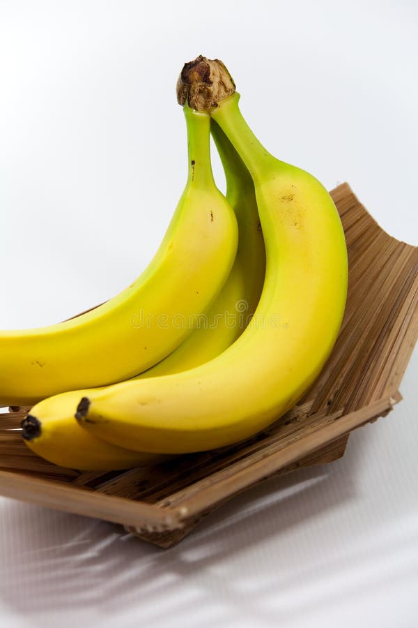 Three Bananas in Wooden Bowl Stock Image - Image of wood, yellow: 13880713