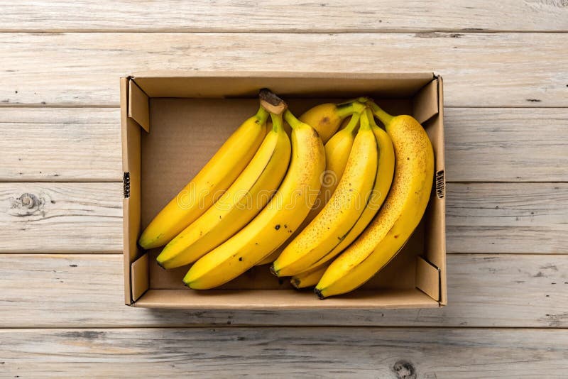Bananas in a Box on a Wooden Background Stock Image - Image of crate ...