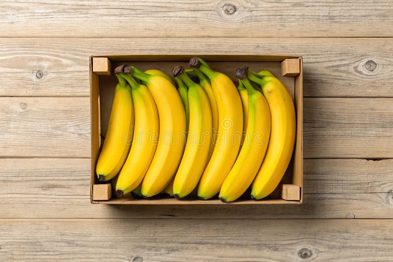 Bananas in a Box on a Wooden Background Stock Photo - Image of fruit ...