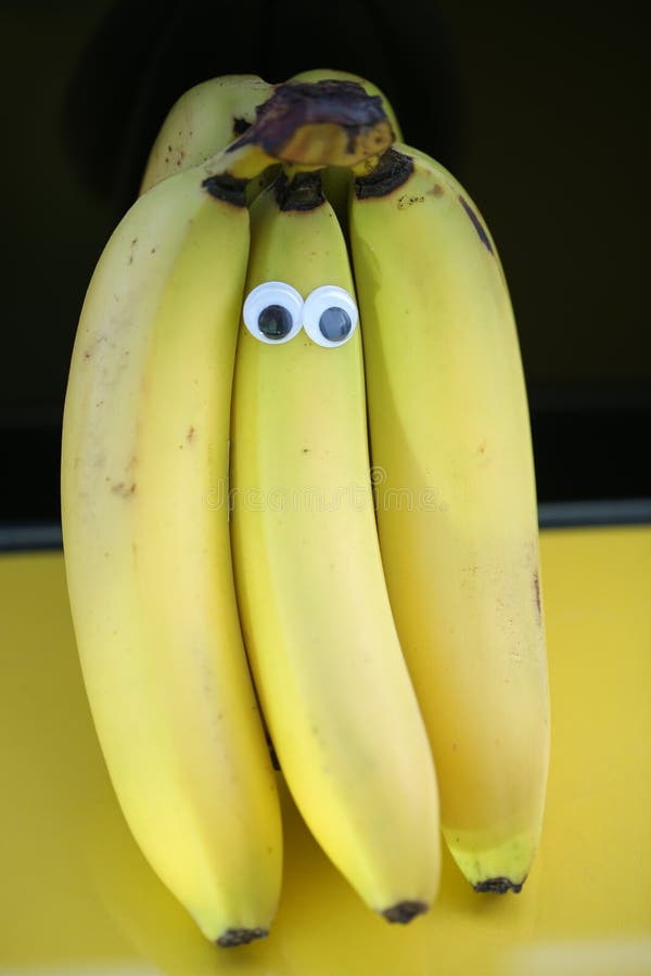 Bananas on a String, Yellow Background, Funny Bananas with Eyes ...