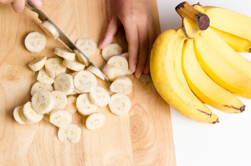 Banane Mûre De Tranche Sur Le Conseil En Bois Image stock - Image du ...