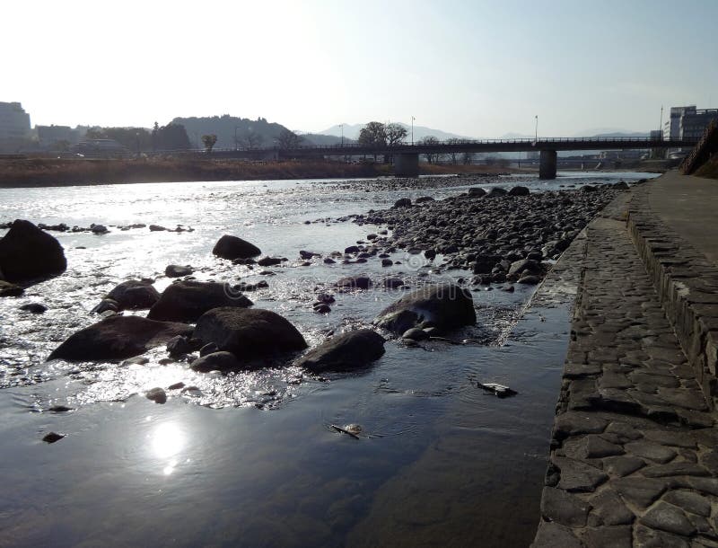 Banco De Rio Concreto Ao Longo Do Rio De Kuma Foto de Stock - Imagem de ...