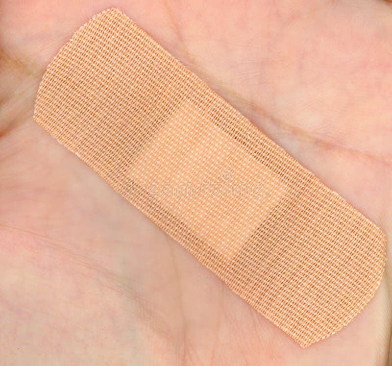Band aid bandage on hand stock photo. Image of bandage - 126571678