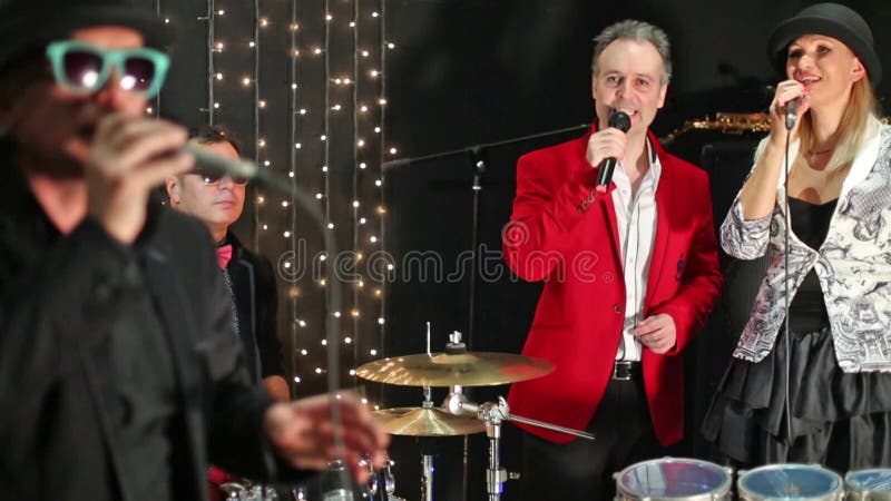 Band of Four are Playing Music and Singing in Stock Footage - Video of ...