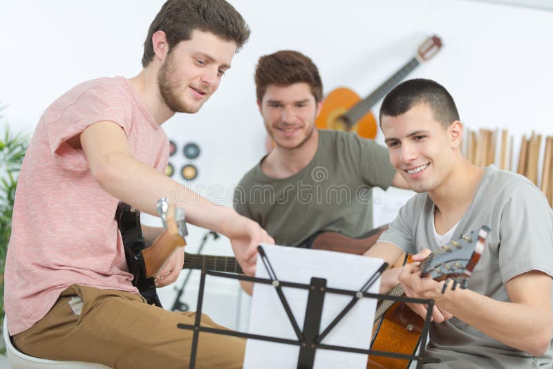 Band of musicians playing stock image. Image of male - 124179803