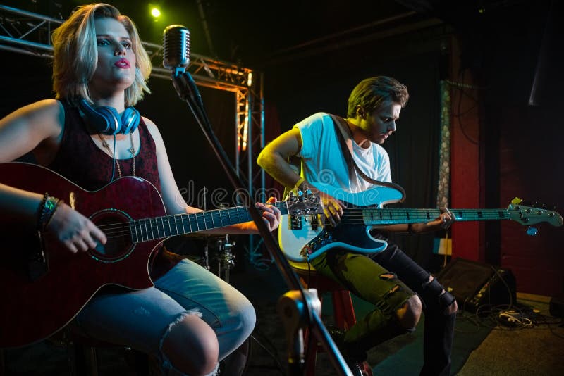 Band performing on stage editorial stock image. Image of caucasian ...