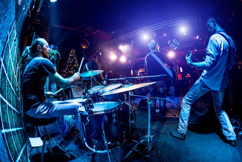 Band performs on stage stock photo. Image of grunge, stage - 27849280