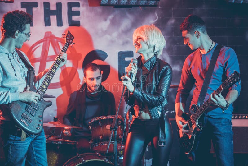 Band Playing on Stage Making Music Stock Photo - Image of beautiful ...