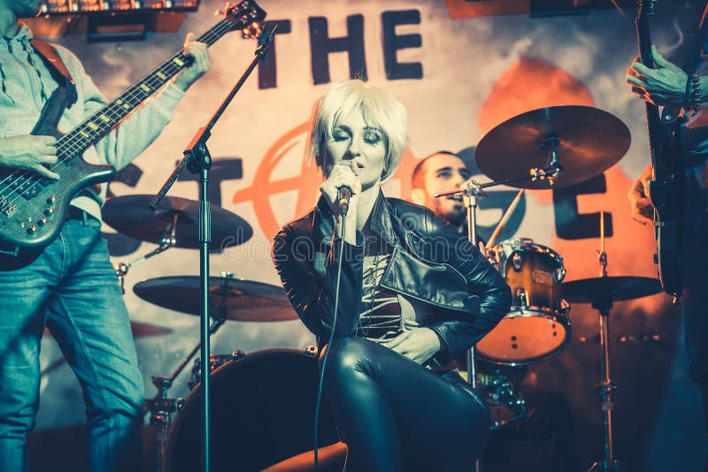 Band Playing on Stage Making Music Stock Photo - Image of band, rock ...