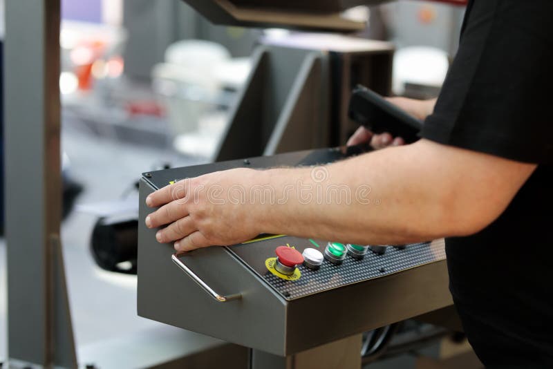 Band Saw Machine Operator at the Control Console Stock Photo - Image of ...