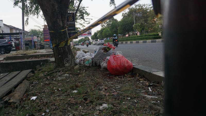 Garbage Plastic Bag at Roadside Editorial Image - Image of road ...