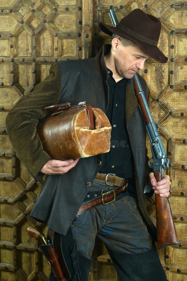 Bandit with gun stock photo. Image of colt, cowboy, revolver - 42904432