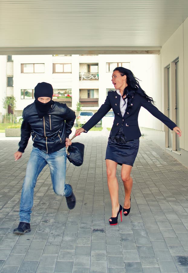 Bandit stealing woman bag stock image. Image of criminal - 26242871