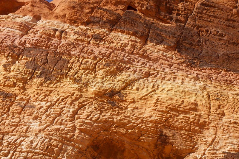 Bands of Color on Red Rock stock image. Image of sand - 26555585